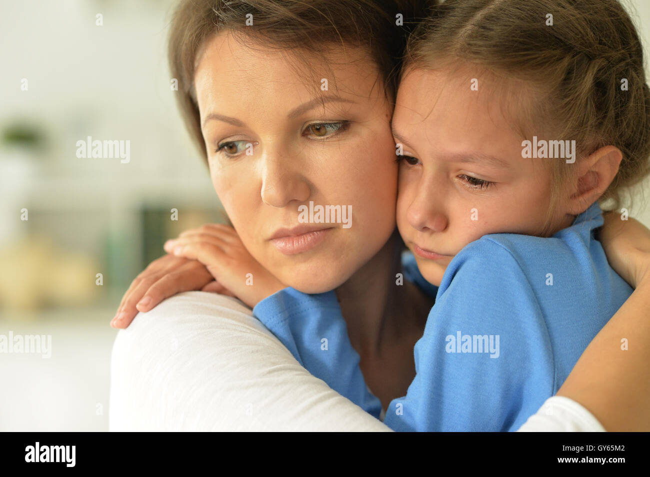 Sad mom with baby hi-res stock photography and images - Alamy
