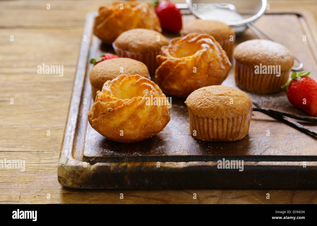 homemade pastries, sweet muffins with powdered sugar Stock Photo - Alamy
