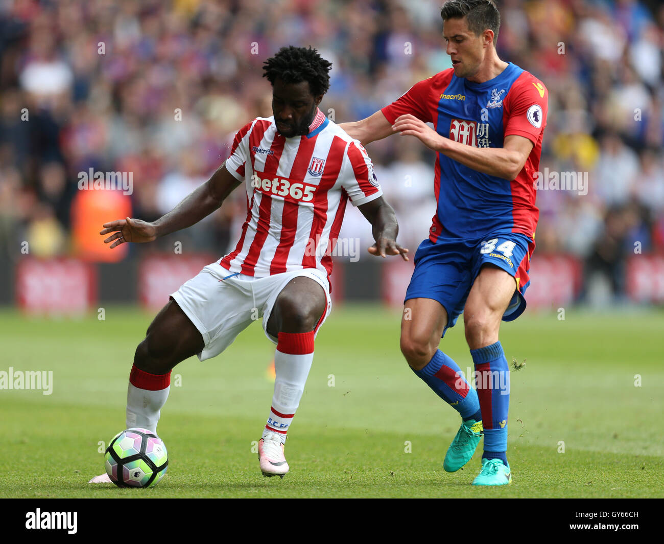 Stoke City's Wilfriend Bony (left) and Crystal Palace's Martin Kelly ...