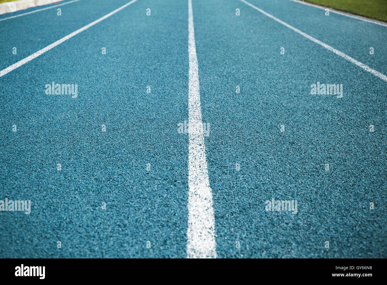 Blue lanes on a running track Stock Photo - Alamy