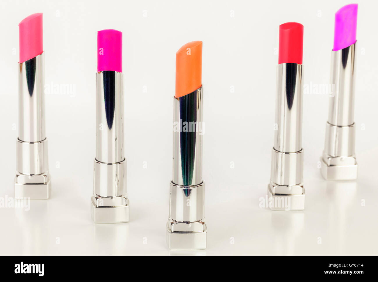 Lipsticks in different colors in row Stock Photo - Alamy
