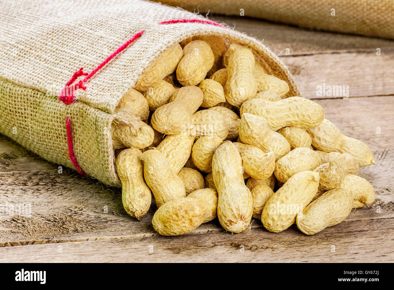 Shelled peanuts on jute fabric bag Stock Photo - Alamy