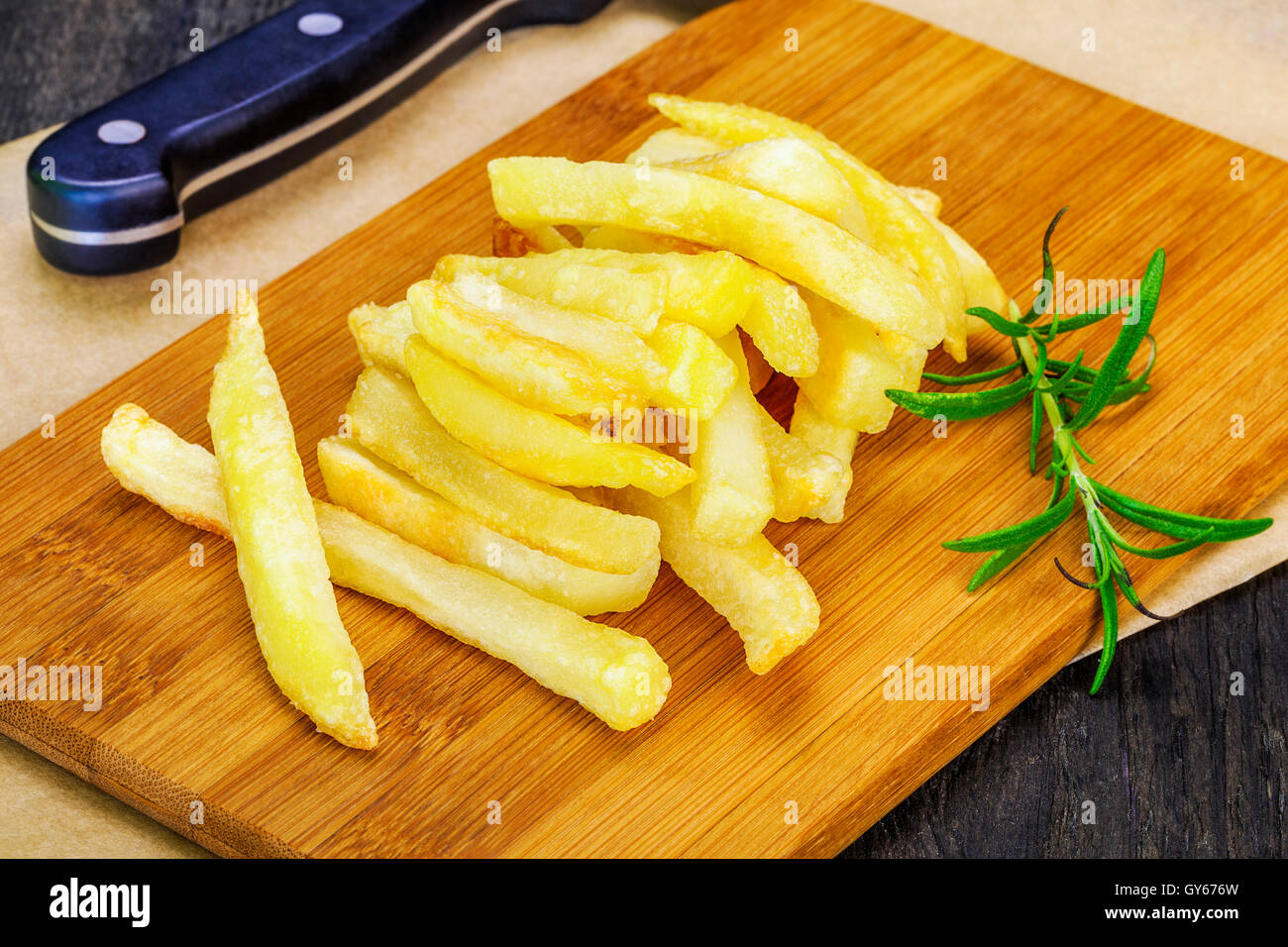 French fries slices with rosemary Stock Photo - Alamy