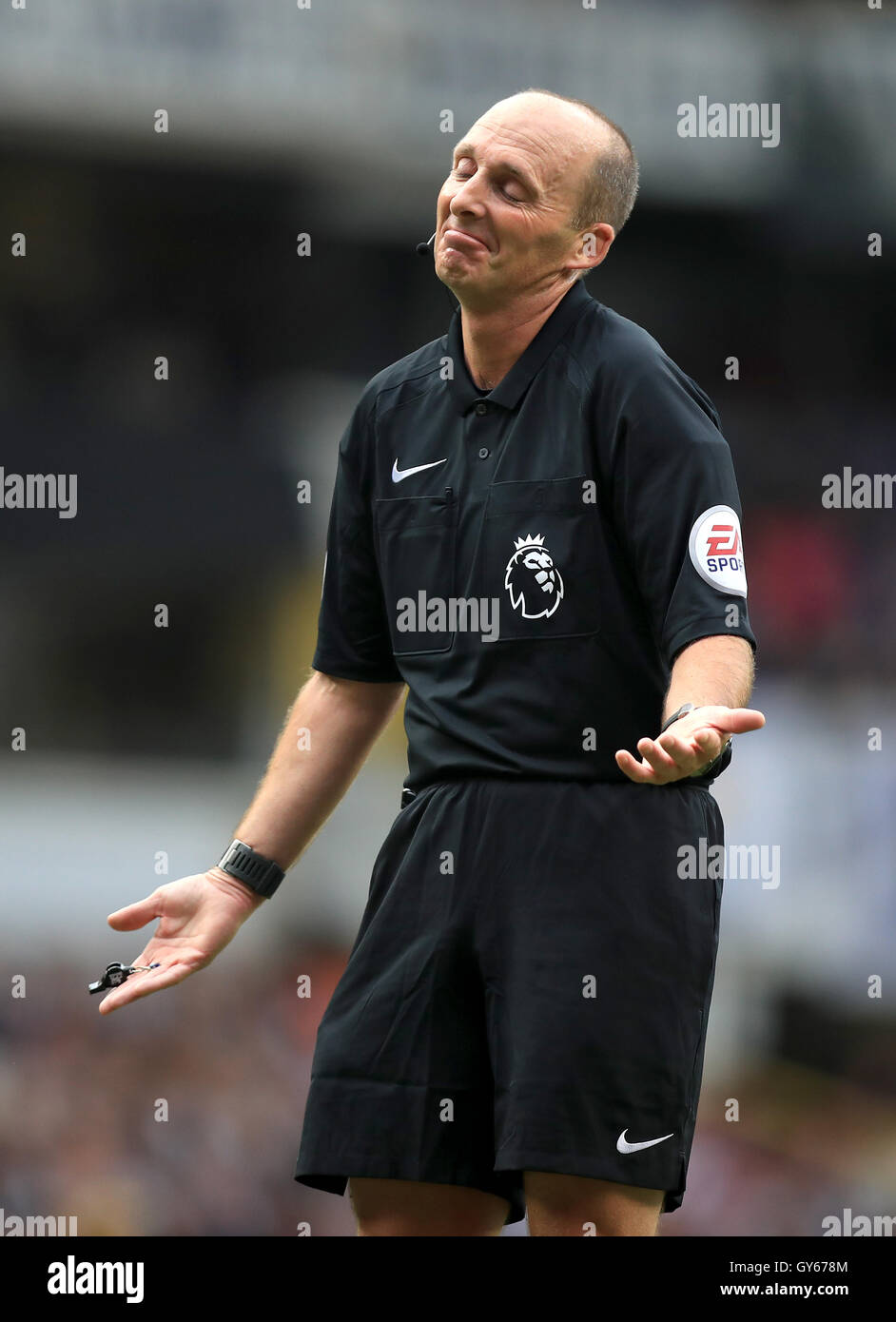 Match referee Mike Dean during the Premier League match at White Hart ...