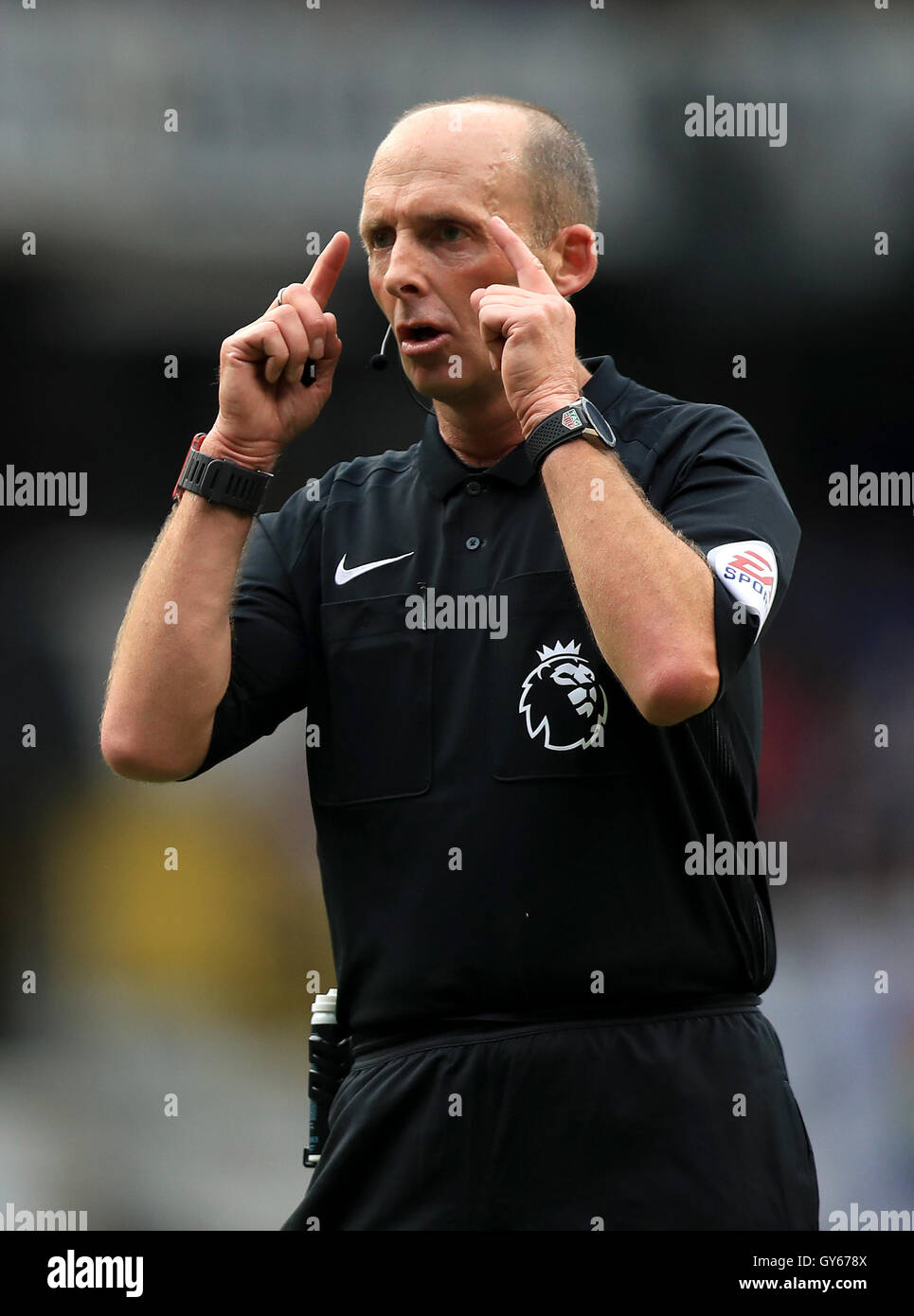 Match referee Mike Dean during the Premier League match at White Hart ...