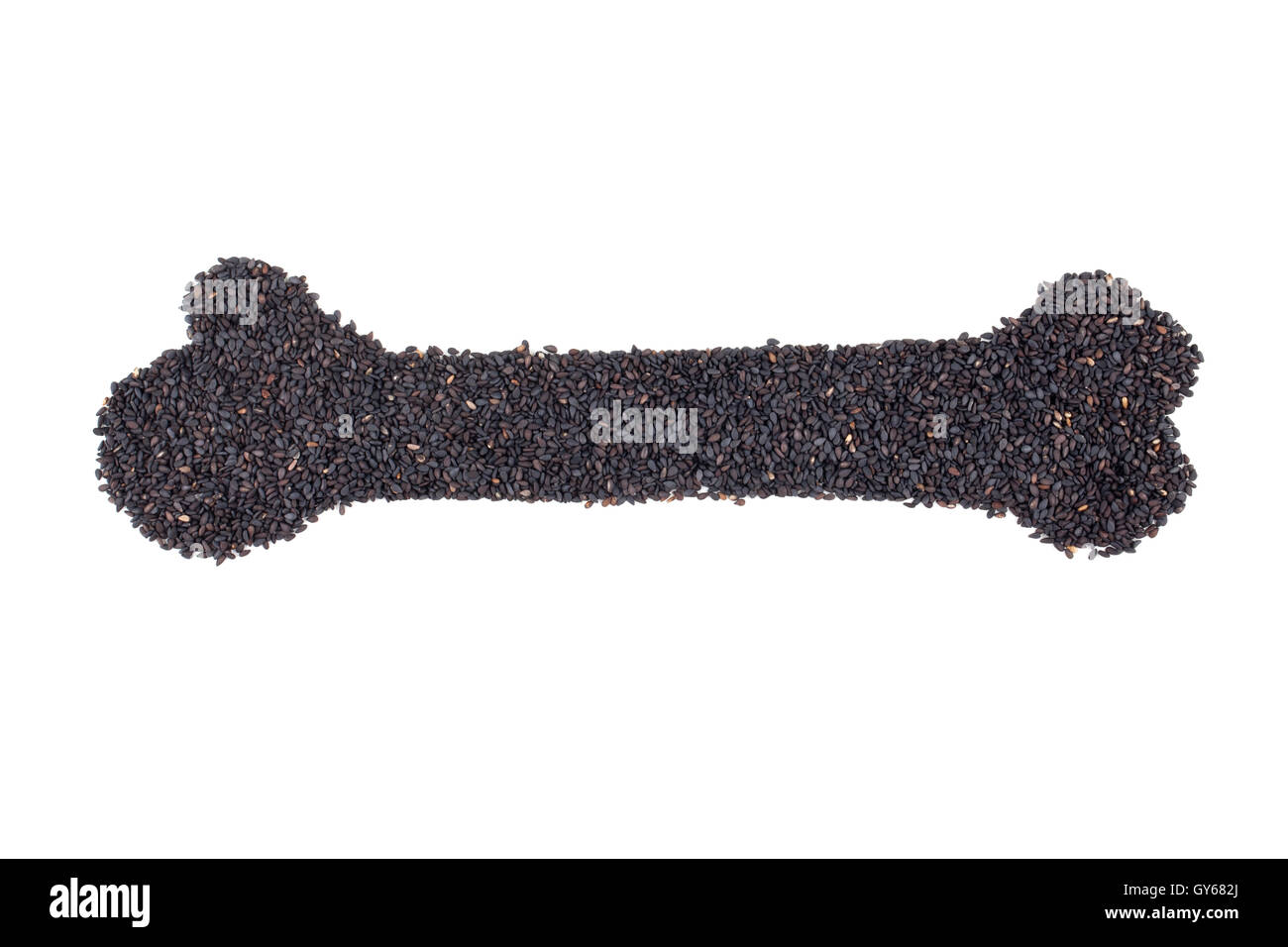 black sesame in bone shape isolated on white background Stock Photo - Alamy
