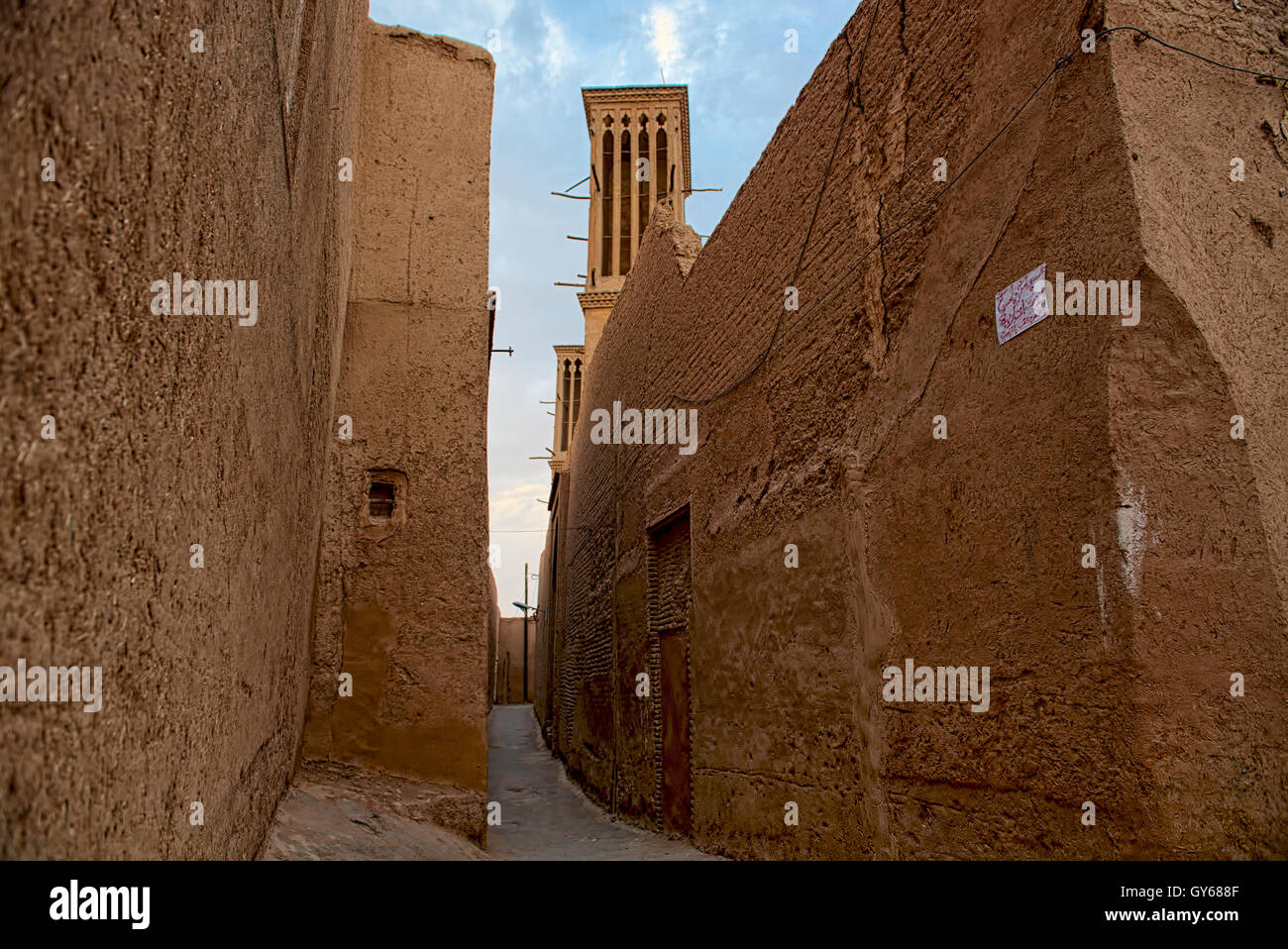 Narrow wall between houses Stock Photo - Alamy