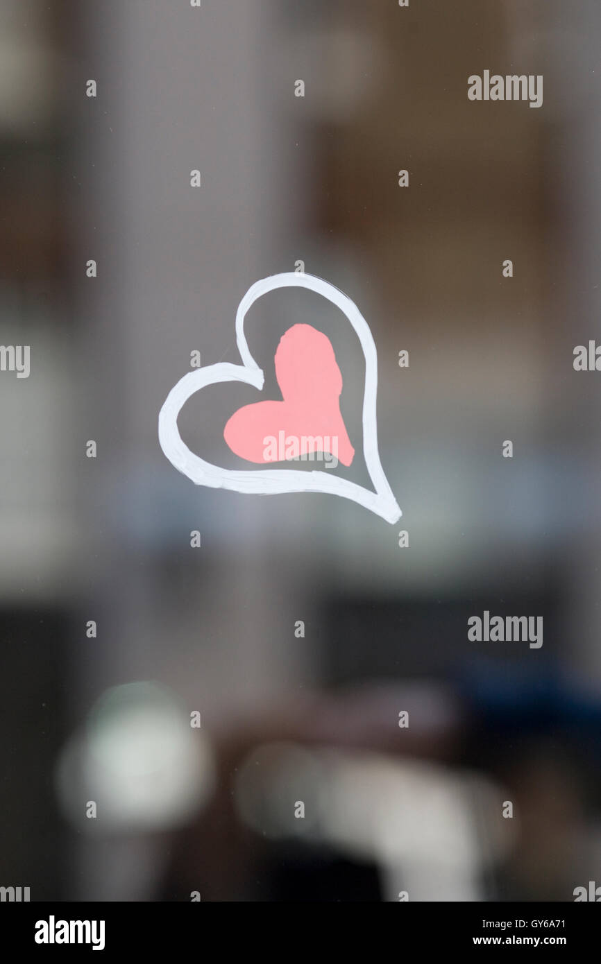 Heart drawn on a shop window Stock Photo - Alamy