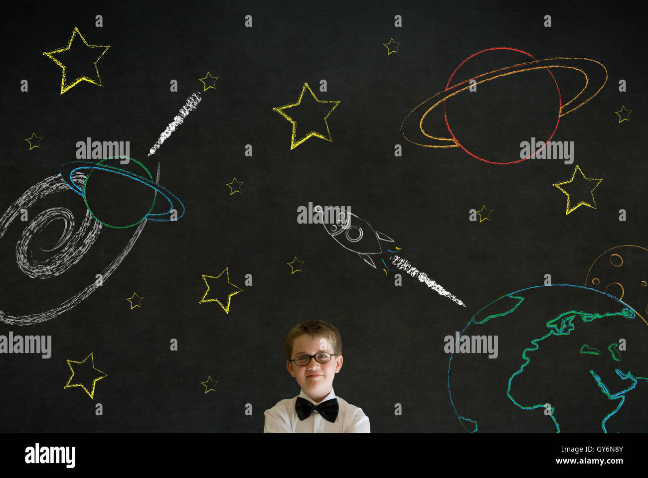 Thinking boy business man with chalk universe planet solar system on ...
