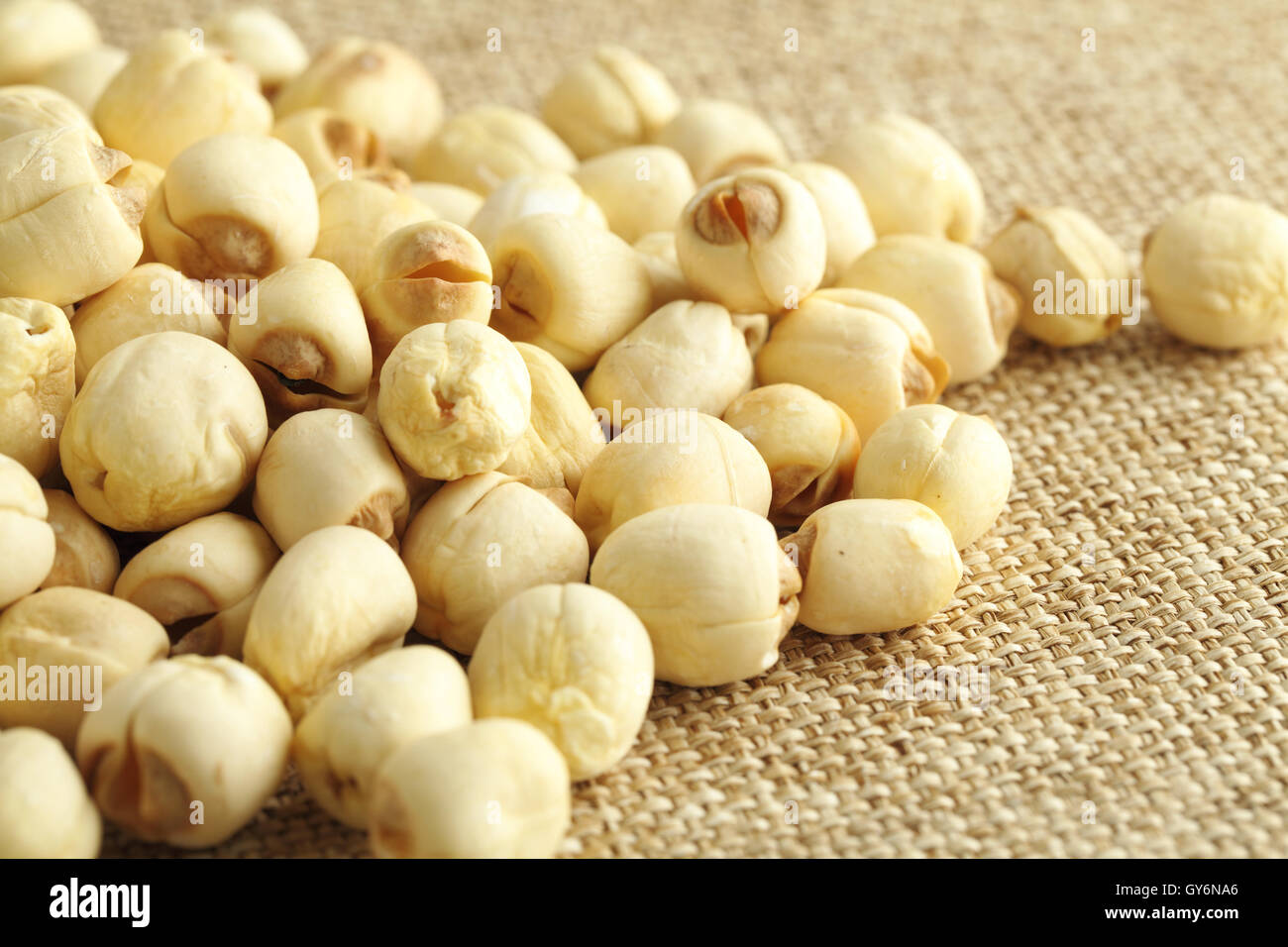 Lotus seed on the linen background Stock Photo - Alamy