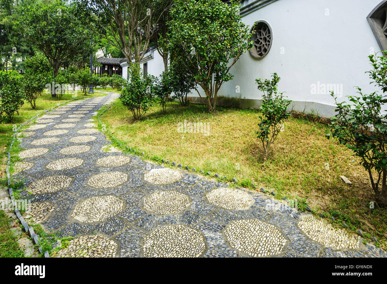 Pebble stone path in chinese garden Stock Photo - Alamy