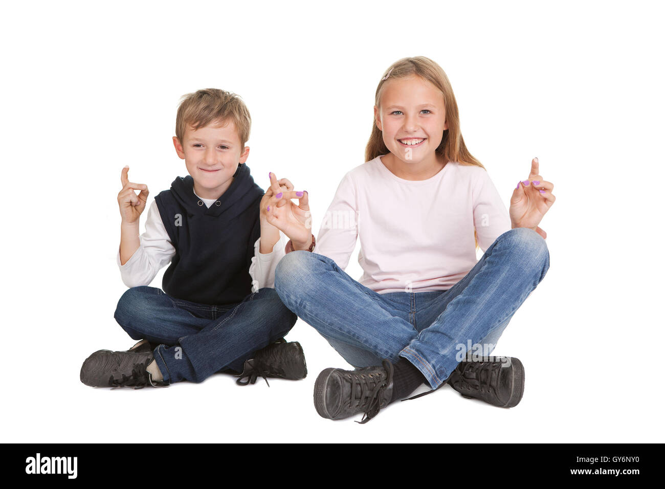 kids sitting in yoga position Stock Photo - Alamy