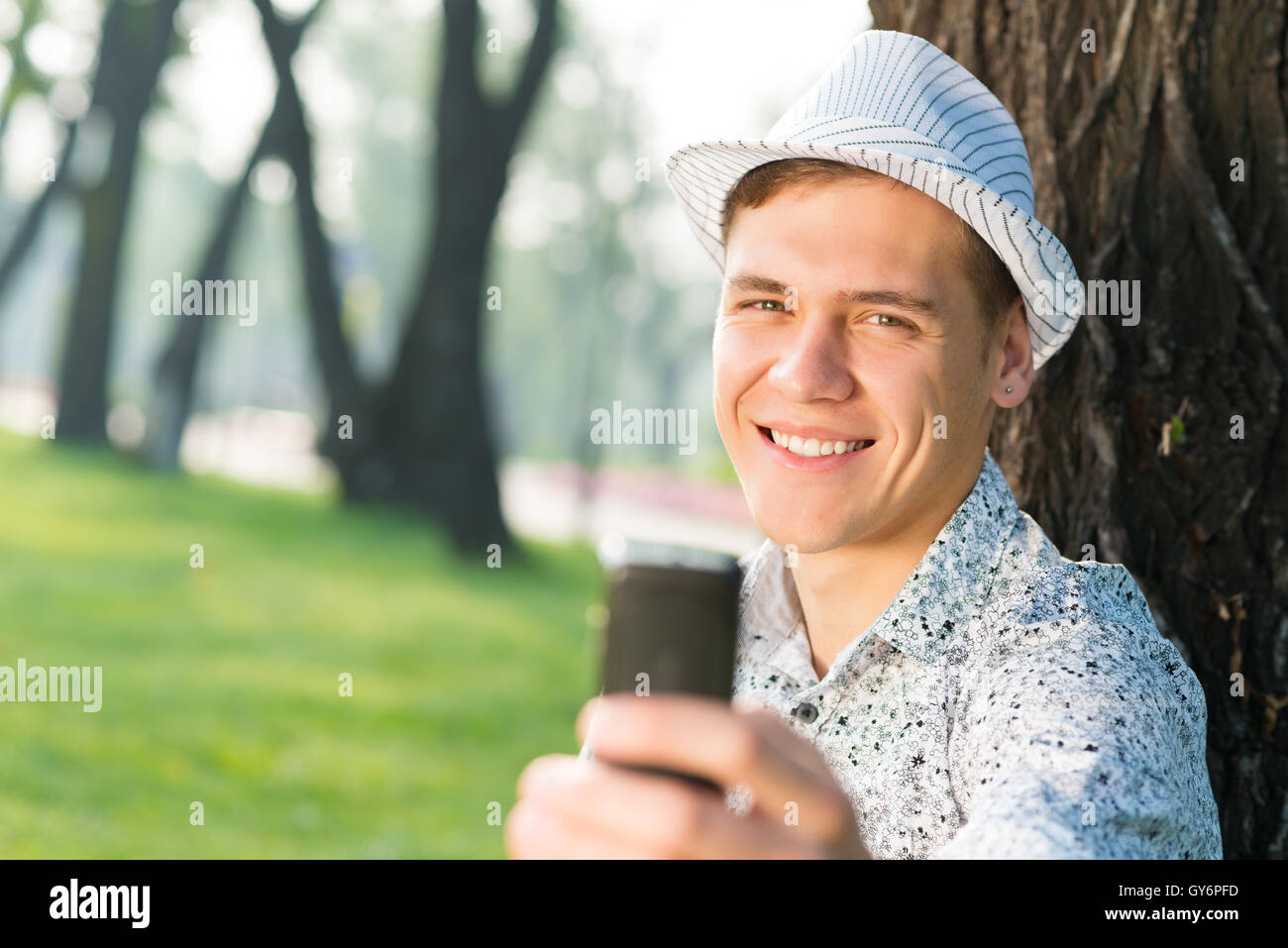 young man with a cell phone Stock Photo - Alamy