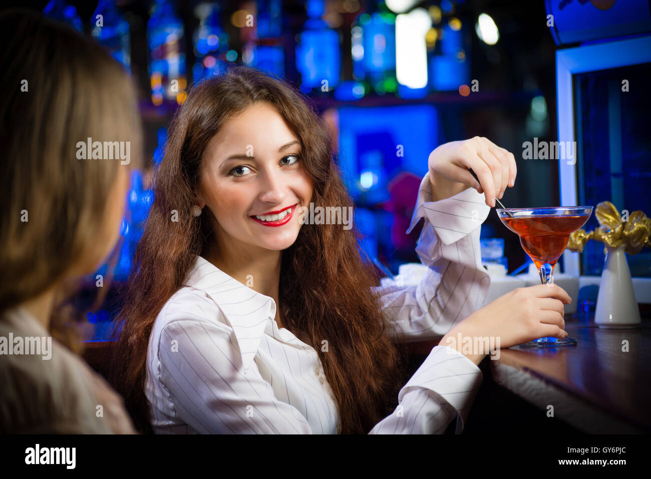 young woman in a bar Stock Photo - Alamy