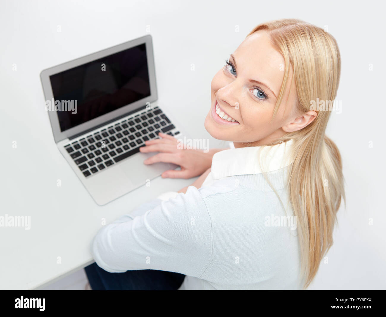 Beautiful woman working on laptop Stock Photo - Alamy