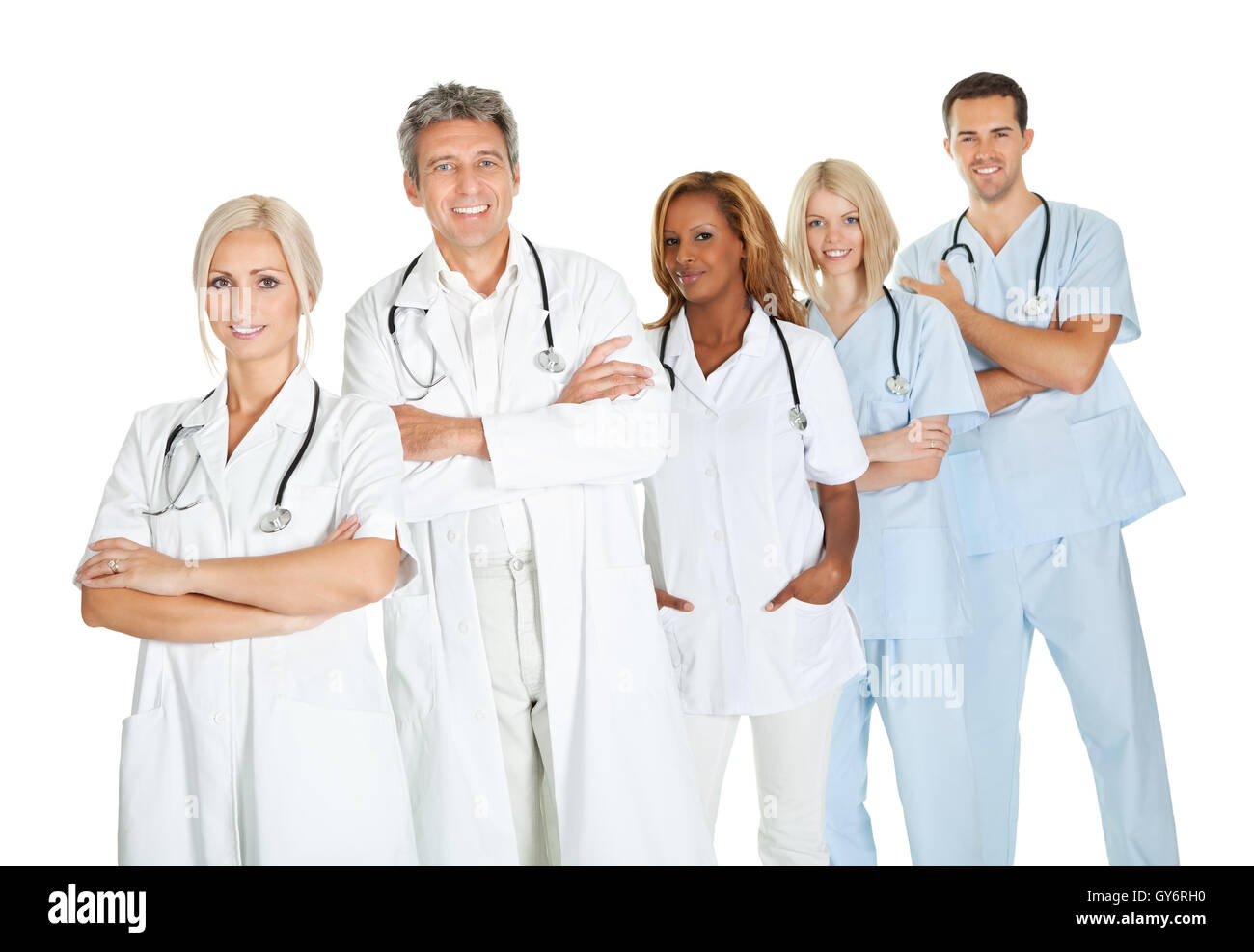 Successful group of doctors standing on white Stock Photo - Alamy