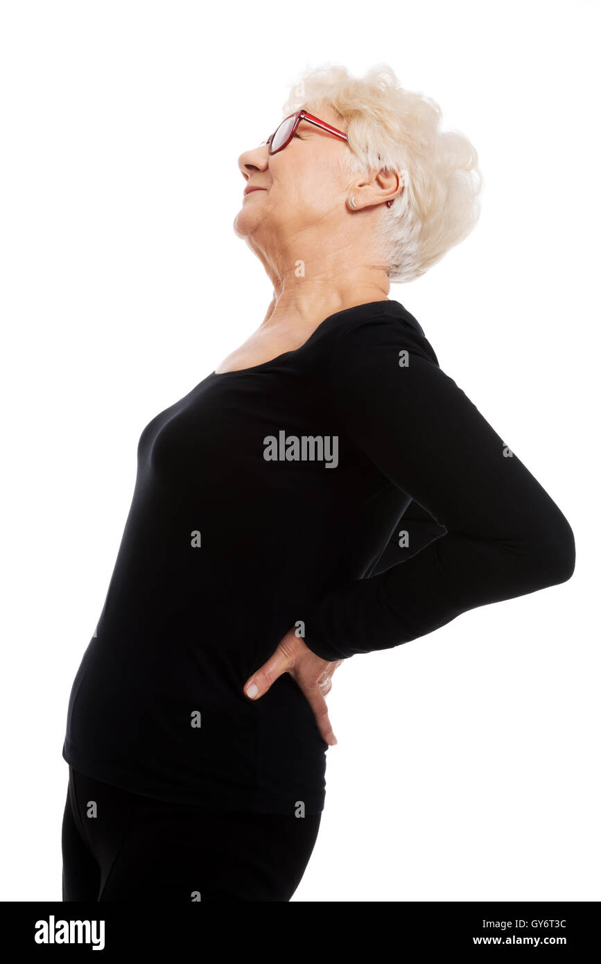An old woman having a back pain Stock Photo - Alamy