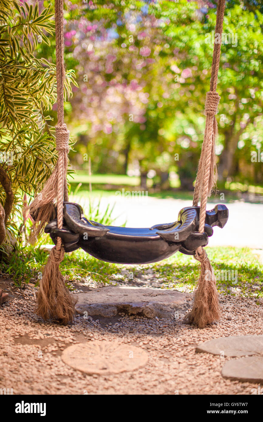 Close-up of a beautiful swing in the garden Stock Photo - Alamy