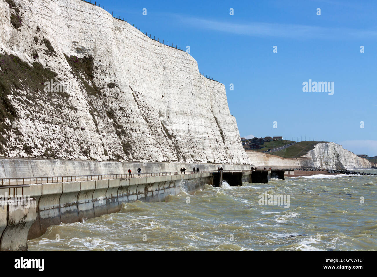 Rough seas buffet the Undercliff walk at Saltdean in Sussex Stock Photo ...