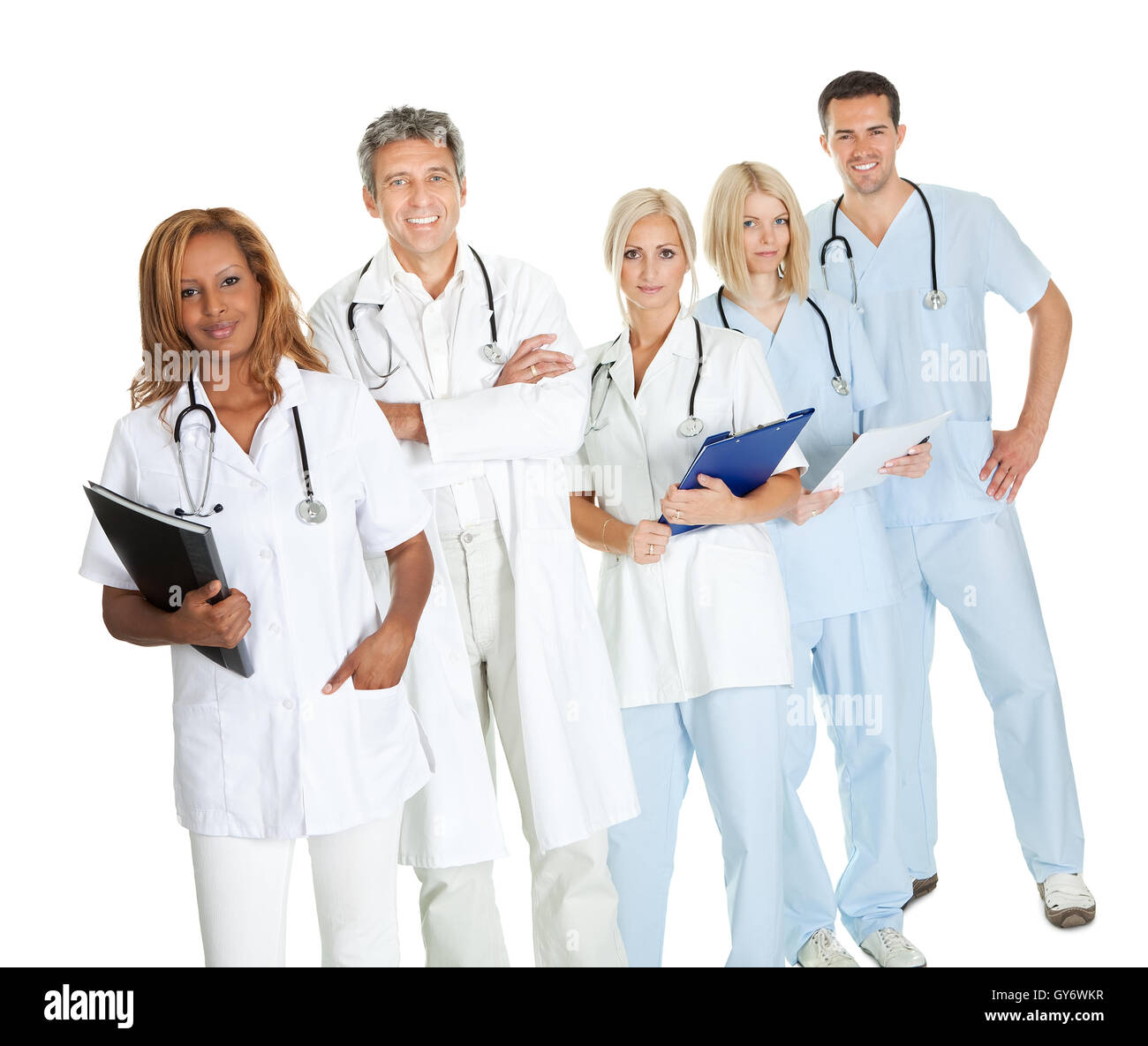 Team of confident doctors over white background Stock Photo - Alamy