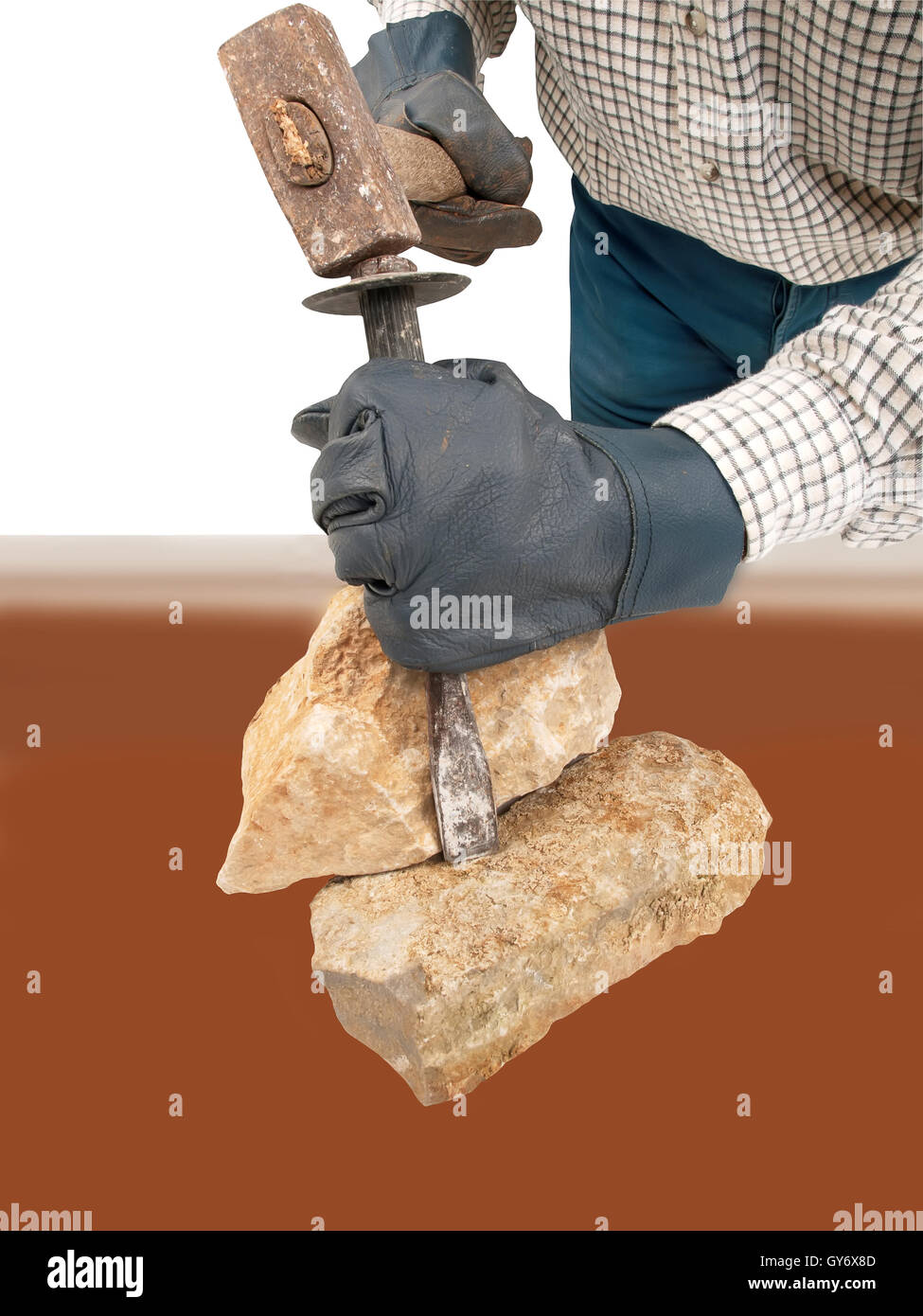 Stone mason with mallet and chisel hi-res stock photography and images ...