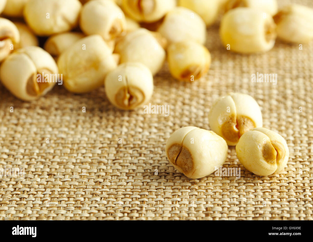 Dry lotus seed on the linen background Stock Photo - Alamy