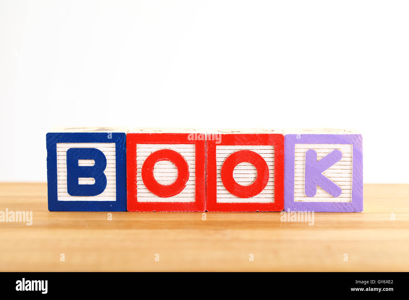 BOOK wooden toy block Stock Photo - Alamy