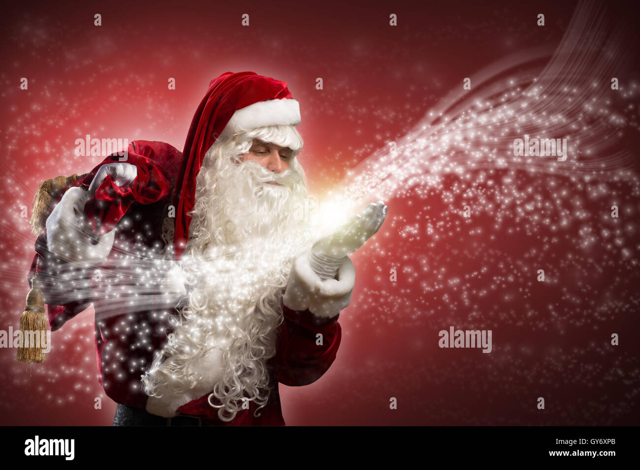 Santa Claus and the magic Stock Photo - Alamy