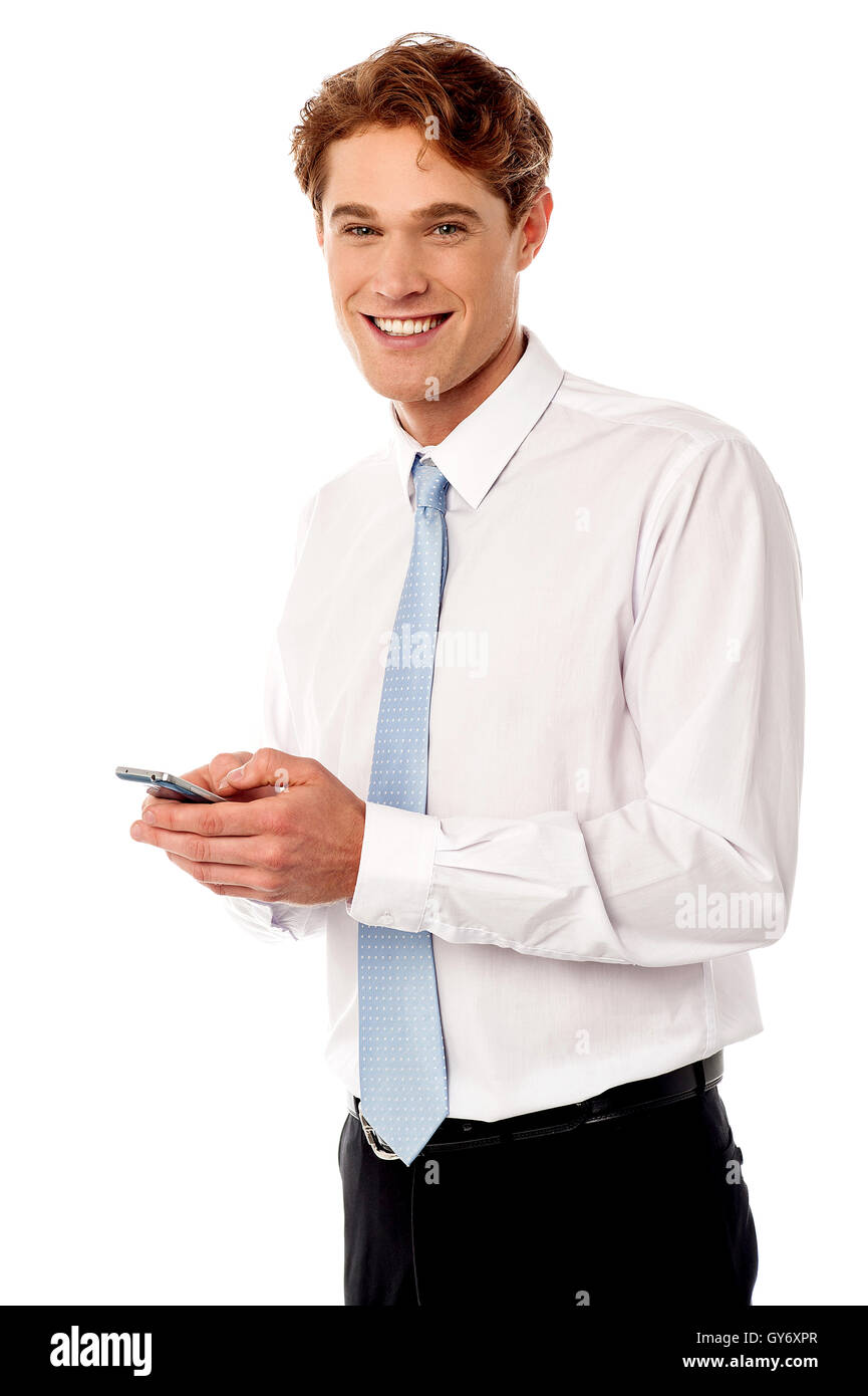 Businessman using mobile phone Stock Photo - Alamy Businessman using mobile phone Stock Photo - Alamy