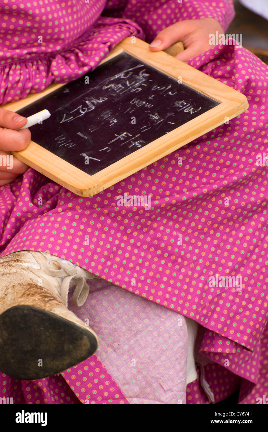 Child re-enactor with chalkboard, Civil War Re-enactment, Cheadle Lake ...