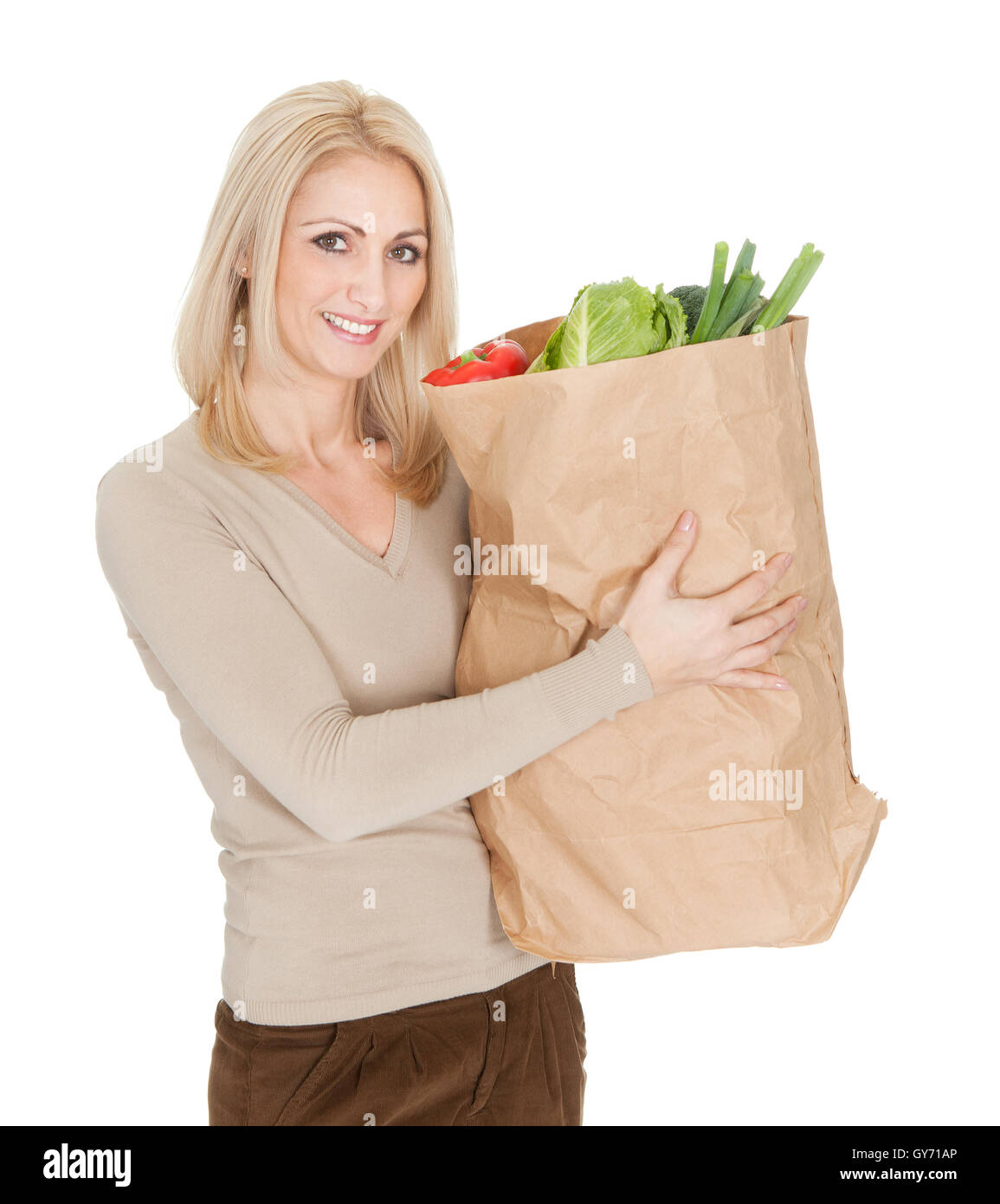 Beautiful woman with grocery bag Stock Photo - Alamy