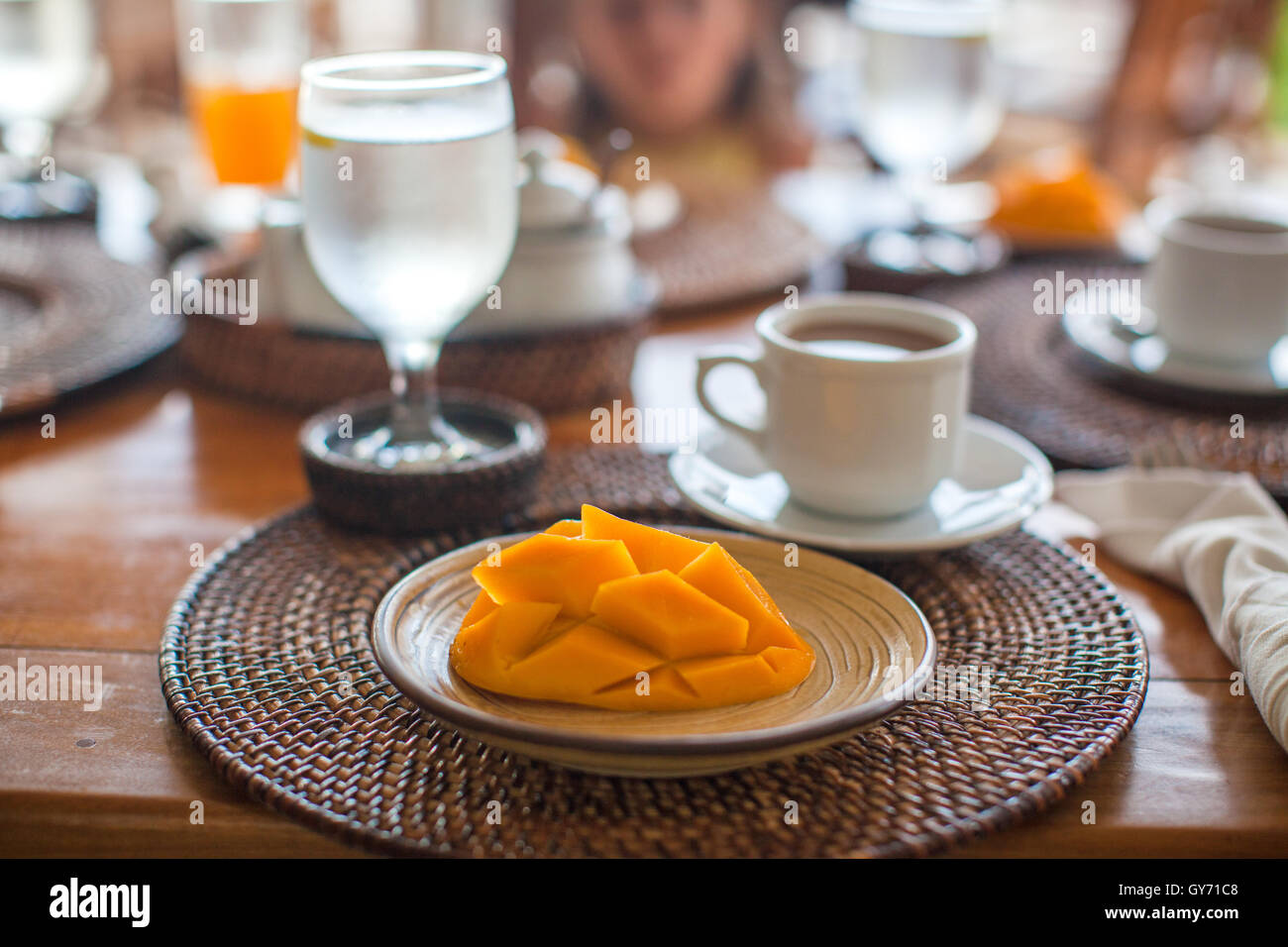Philippino breakfast with mango and coffee Stock Photo - Alamy