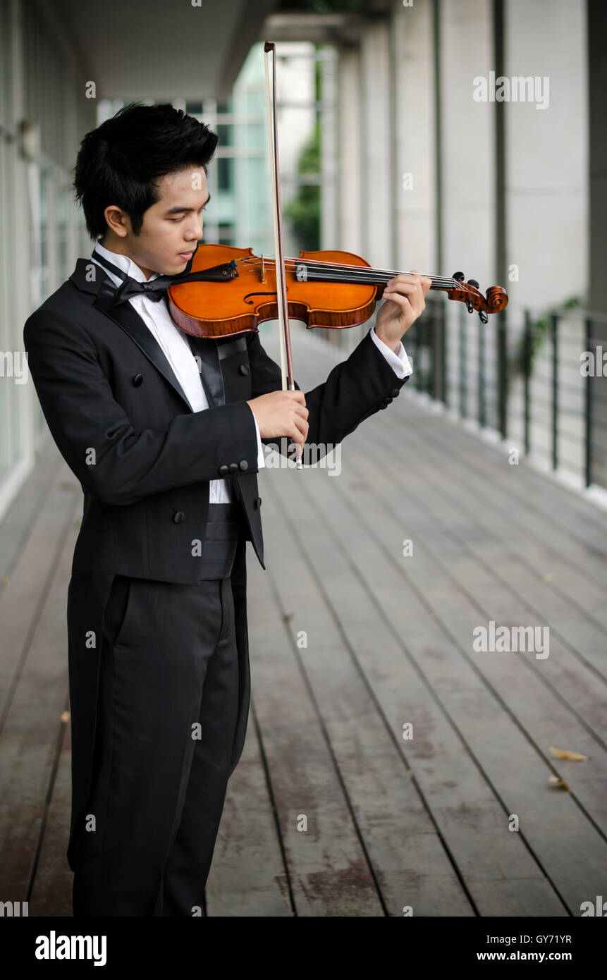 asia man with his violin Stock Photo - Alamy