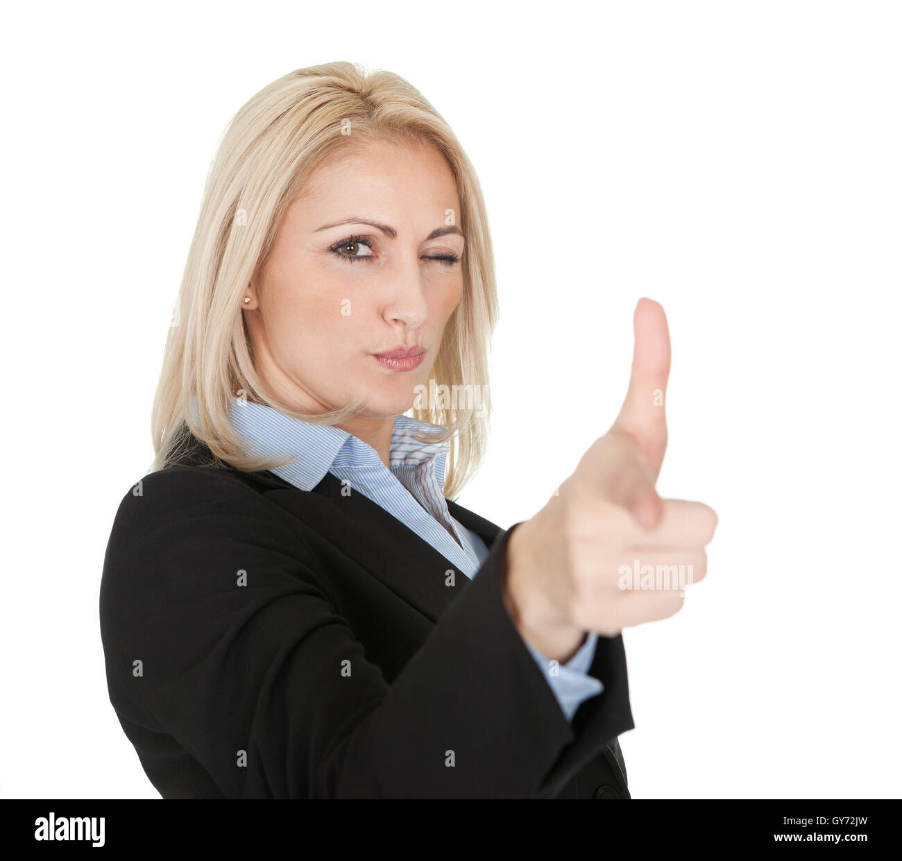 Beautiful business woman making a gun gesture Stock Photo - Alamy