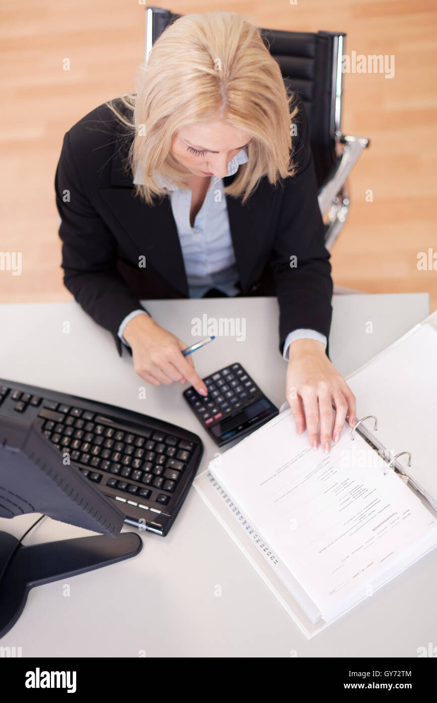 Calculating invoices hi-res stock photography and images - Alamy