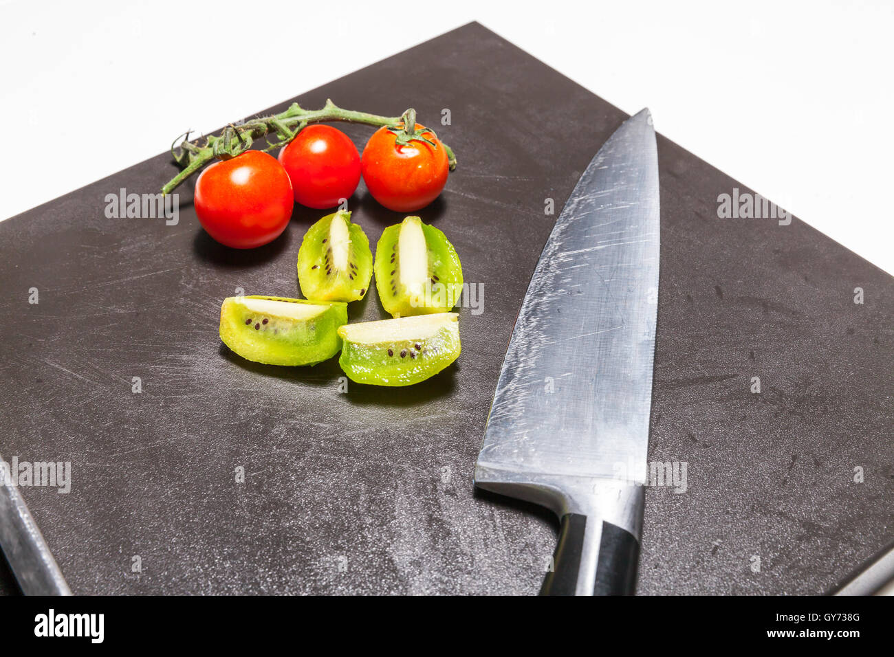 Knife and vegetables Stock Photo - Alamy