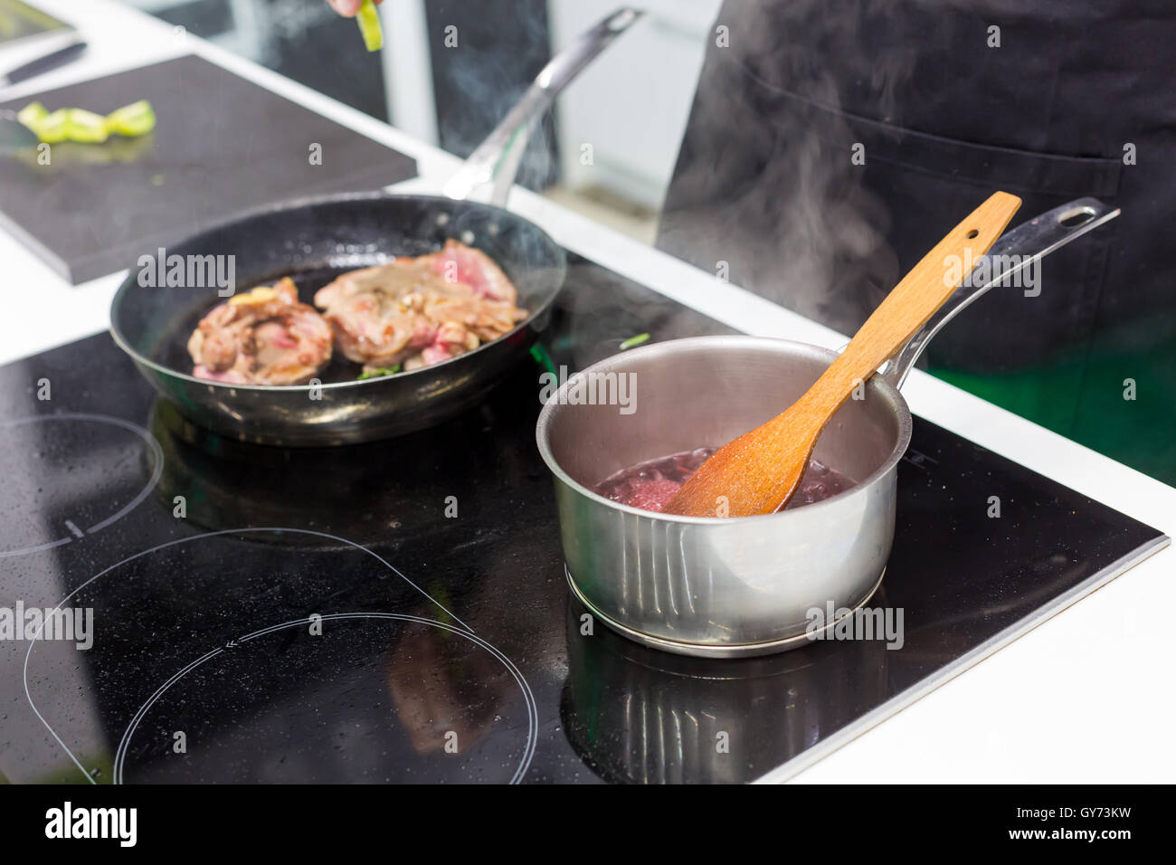 Cooking meat at home Stock Photo - Alamy