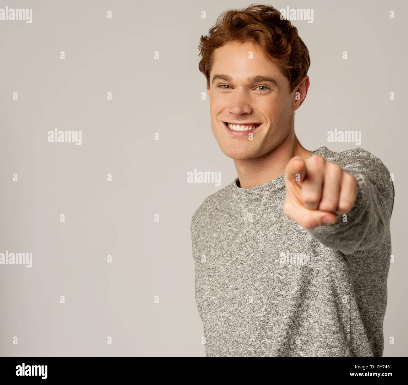 Young smiling guy pointing you out Stock Photo - Alamy Young smiling guy pointing you out Stock Photo - Alamy