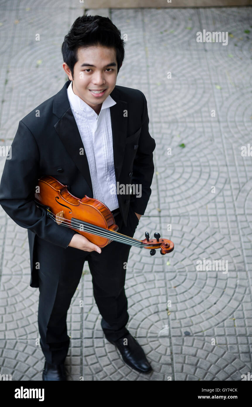 asia man with his violin Stock Photo - Alamy