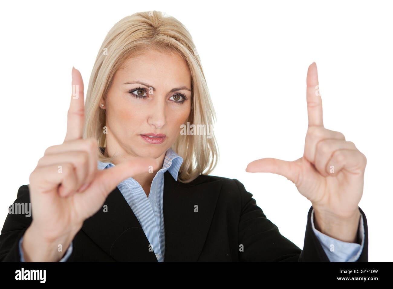Beautiful business woman making a hand frame Stock Photo - Alamy