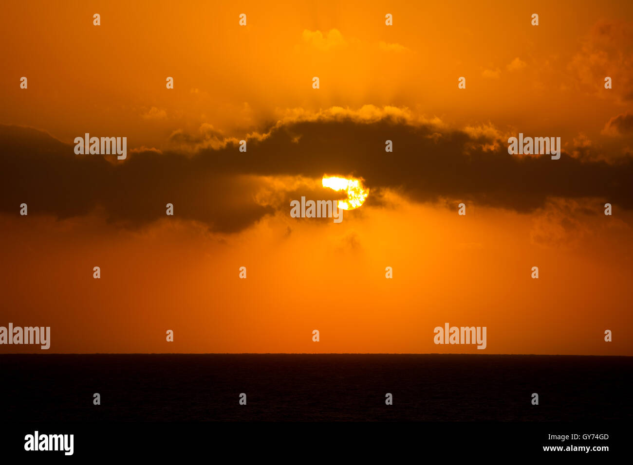 Golden orange sunset with sun in Mediterranean Stock Photo - Alamy