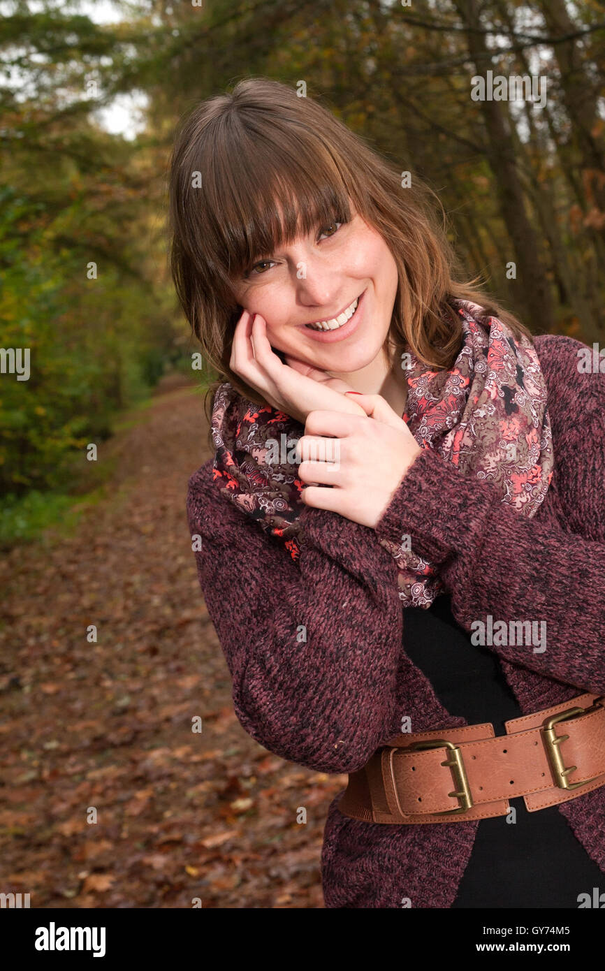 Happy girl with a path behind Stock Photo - Alamy