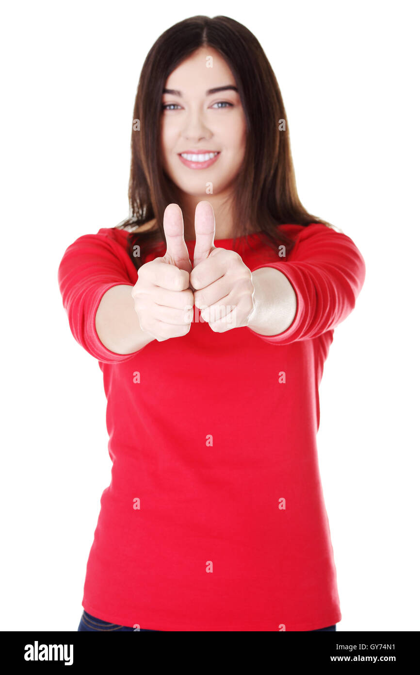 Attractive young woman showing OK Stock Photo - Alamy