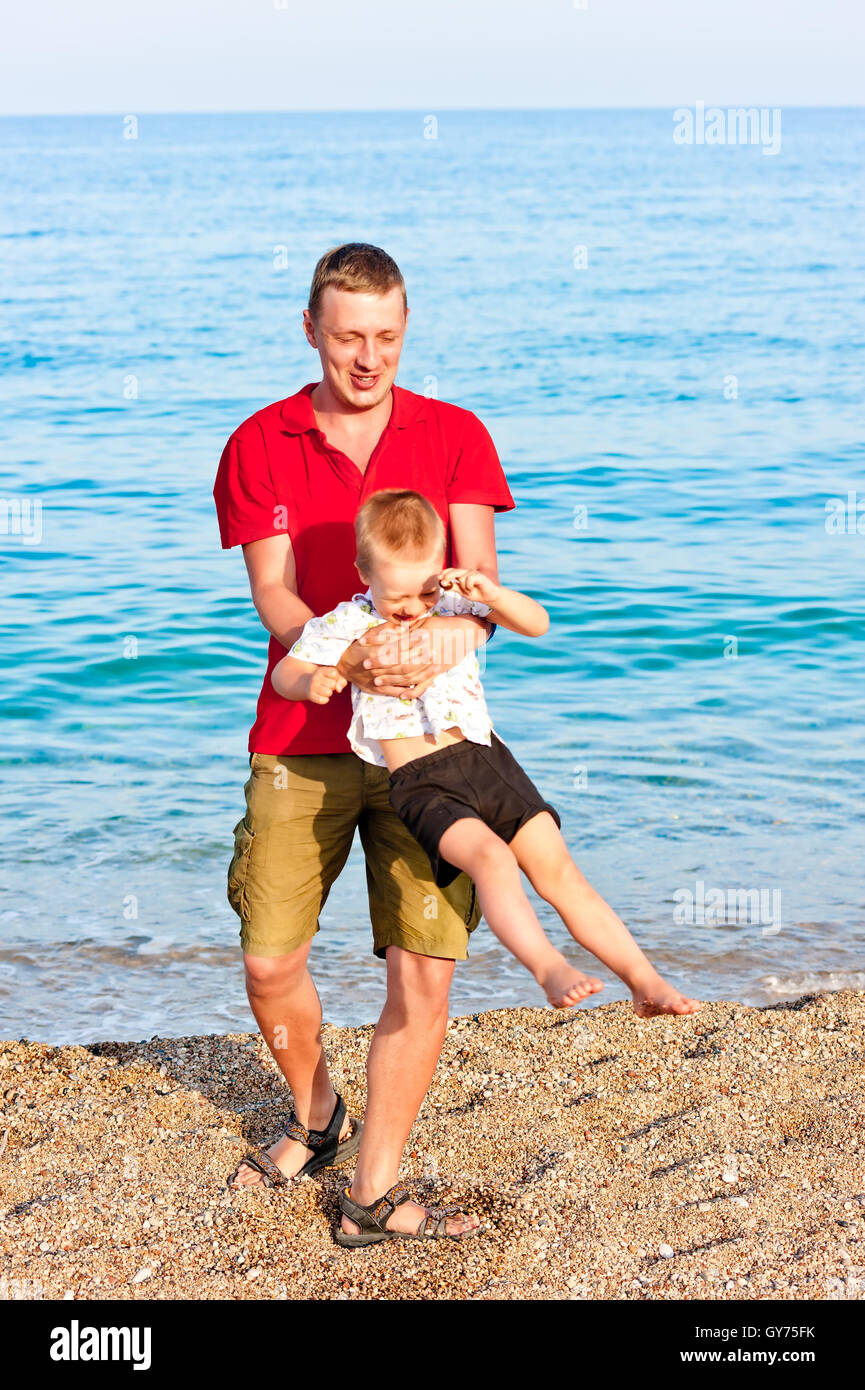 Child rocking back view hi-res stock photography and images - Alamy