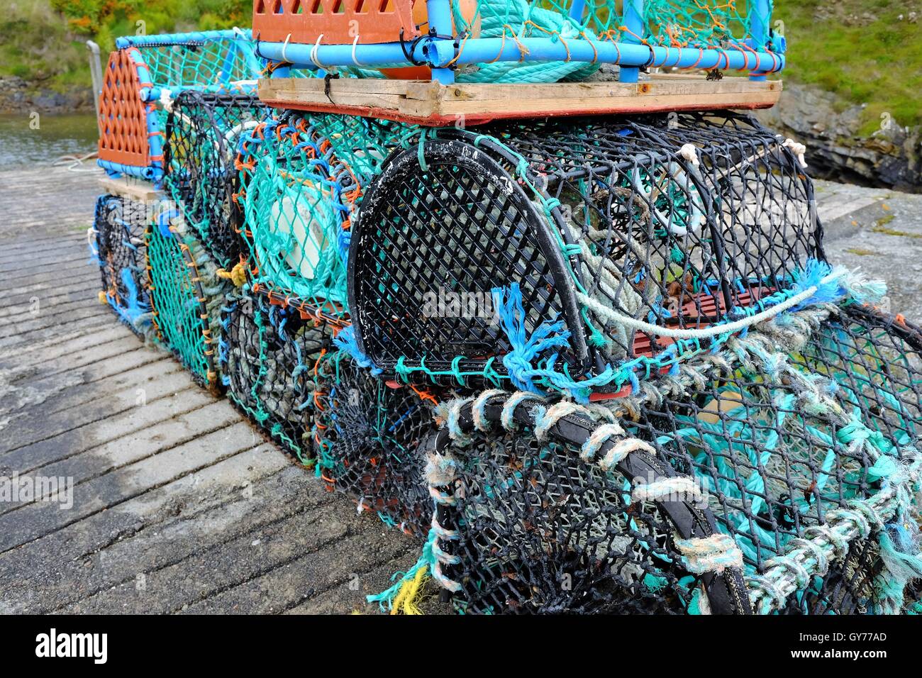 Lobster pots on pier Stock Photo - Alamy