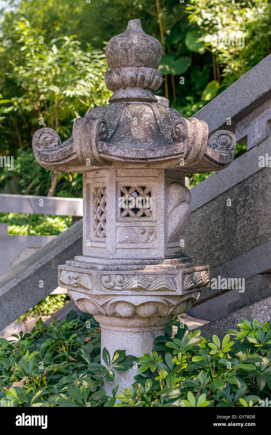 old garden lamp with carvings which is made with cement Stock Photo - Alamy