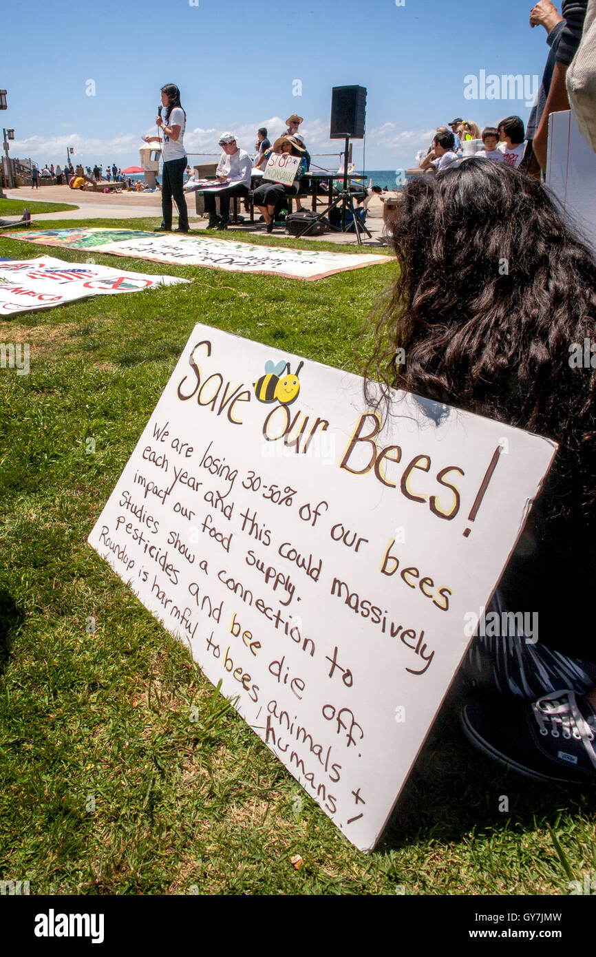 A sign decrying the effect of genetically modified agricultural ...