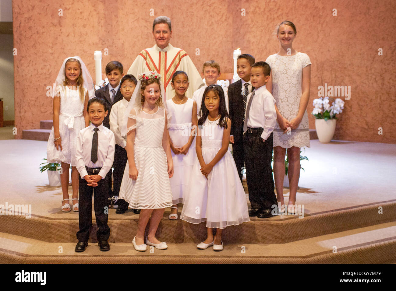 Formally dressed multiracial teens and tweens pose proudly with their ...