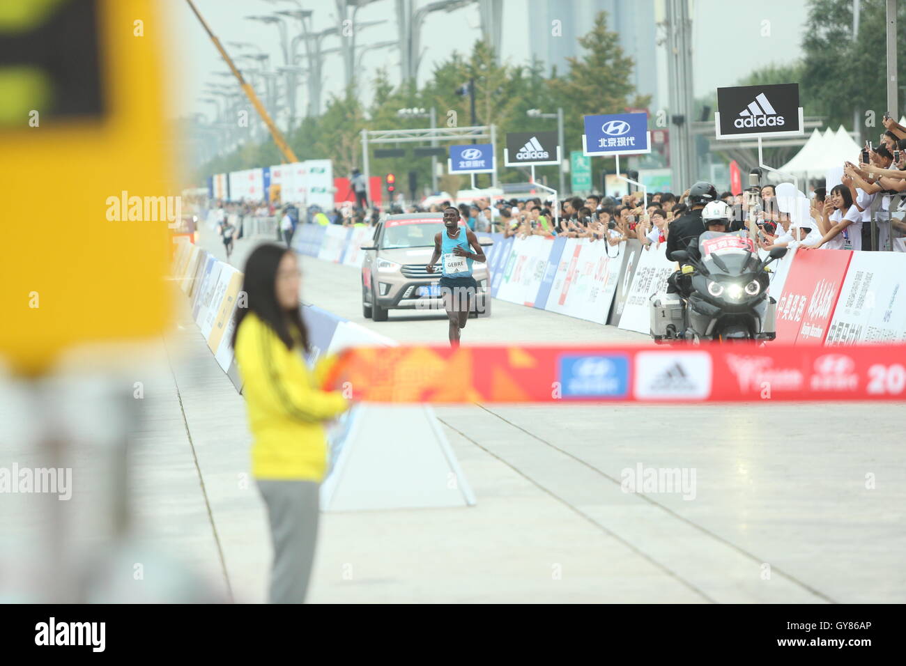 Beijing, Beijing, China. 17th Sep, 2016. Participants run at the ...