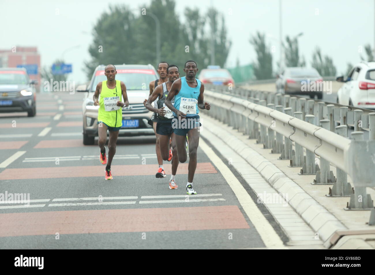 Beijing, Beijing, China. 17th Sep, 2016. Participants run at the ...